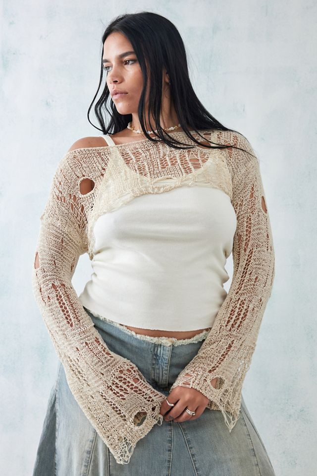 Boléro en maille effilochée UO Carla | Urban Outfitters FR
