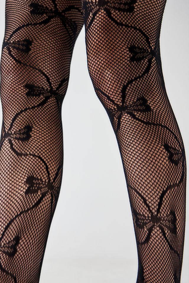 Out From Under Bow Fishnet Tights | Urban Outfitters UK