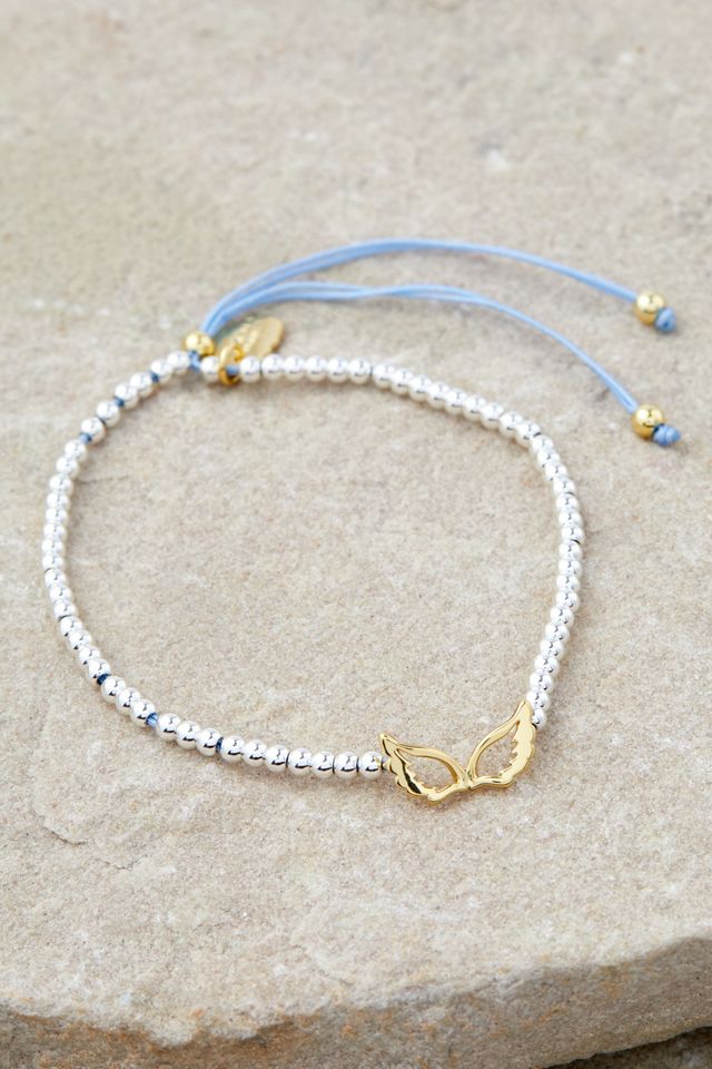 Estella Bartlett Angel Wings Louise Bracelet | Urban Outfitters UK