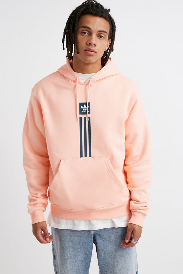 adidas - Sweat à capuche Glow rose | Urban Outfitters FR