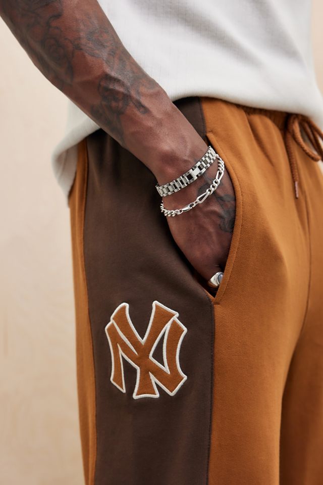 New Era Urban Exclusive Walnut Base NY Joggers | Urban Outfitters UK