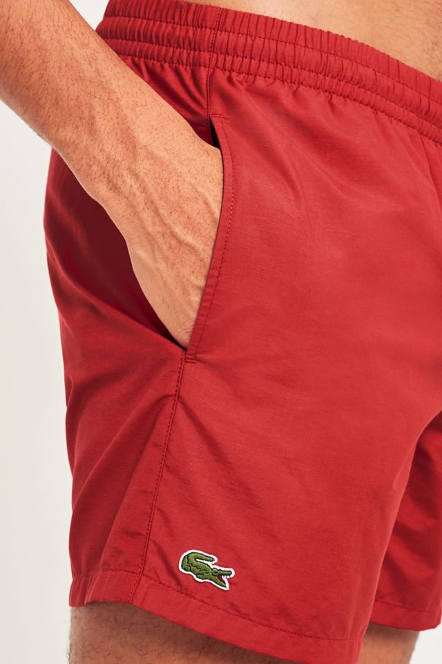 Lacoste Croc Red Swim Shorts | Urban Outfitters UK