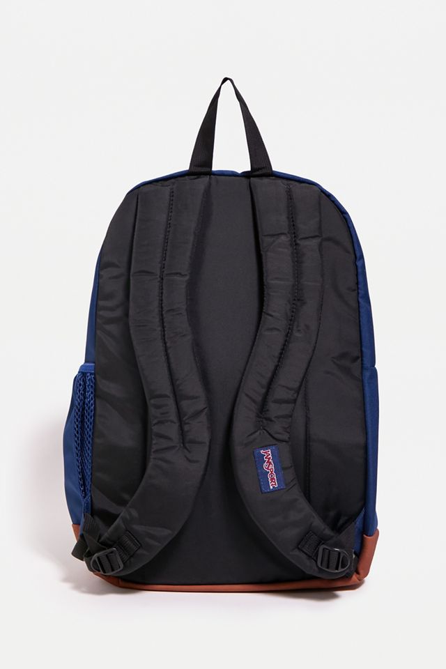 Mochila jansport azul marino para estudiantes | Urban Outfitters ES
