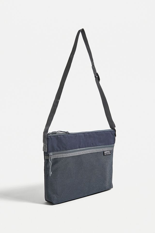 Gramicci Navy Sacoche Crossbody Bag | Urban Outfitters UK
