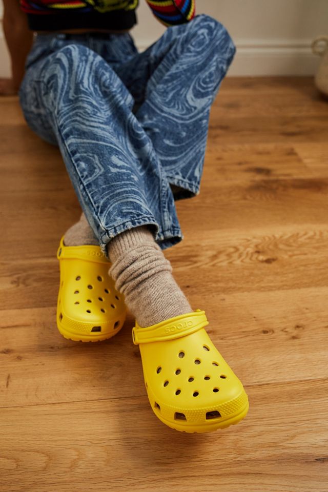 Crocs Lemon Classic Clogs | Urban Outfitters UK