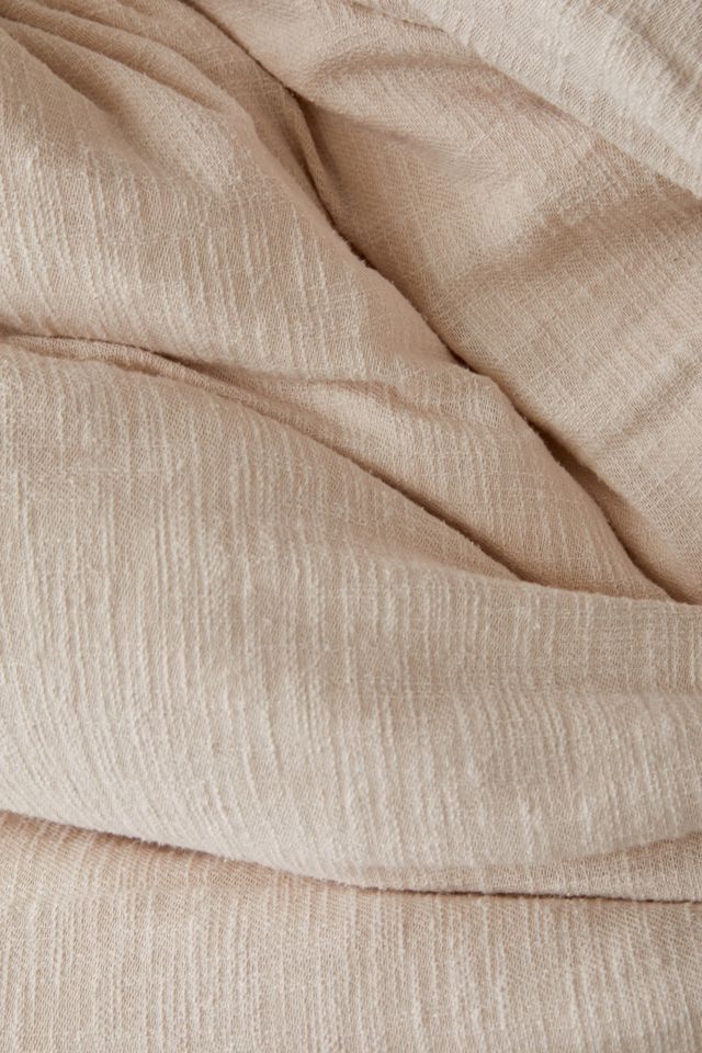 Housse de couette confortable en gaze neutre avec un sac en tissu ...