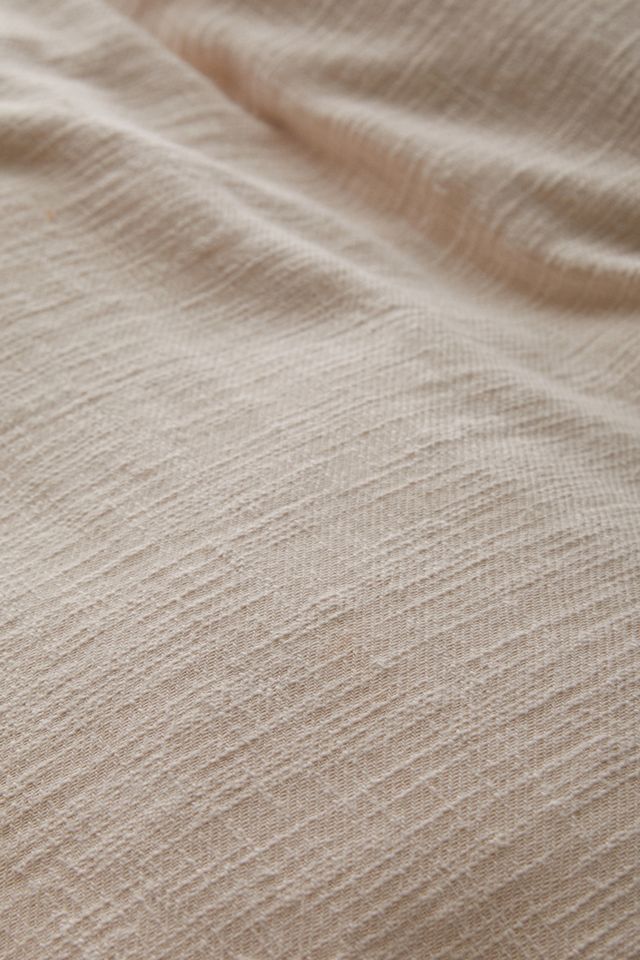 Housse de couette confortable en gaze neutre avec un sac en tissu ...