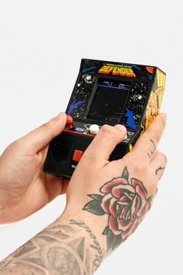 Handheld Defender Arcade Game | Urban Outfitters UK
