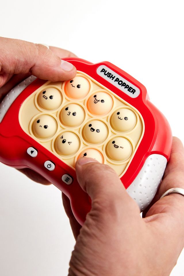Red Push Popper Game | Urban Outfitters UK
