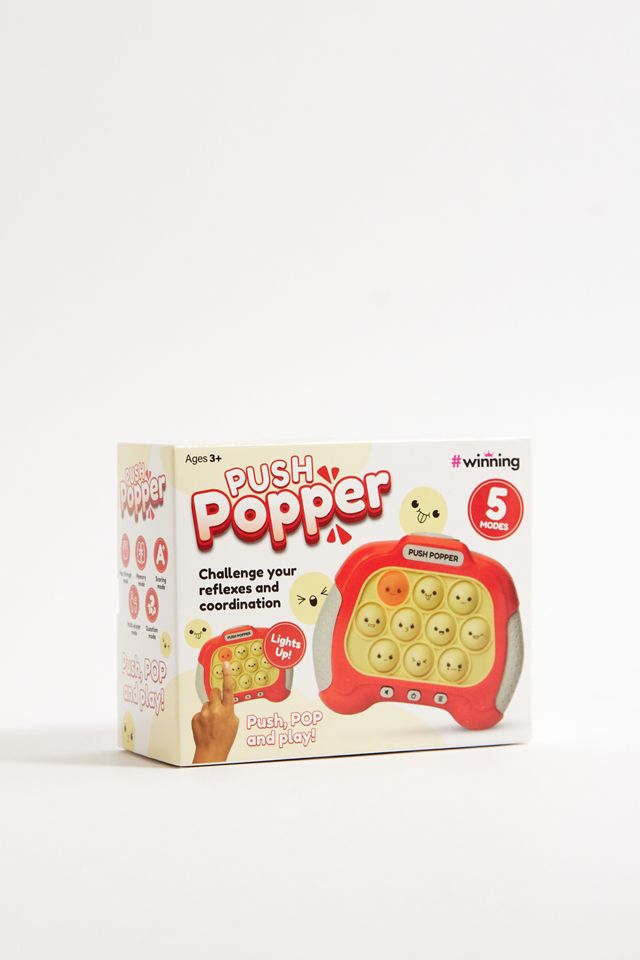 Red Push Popper Game | Urban Outfitters UK