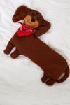 Huggable Dachshund Heating Pad | Urban Outfitters UK