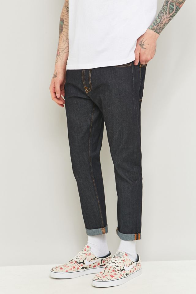 Nudie Jeans Brute Knut Dry Navy Tapered Jeans | Urban Outfitters UK