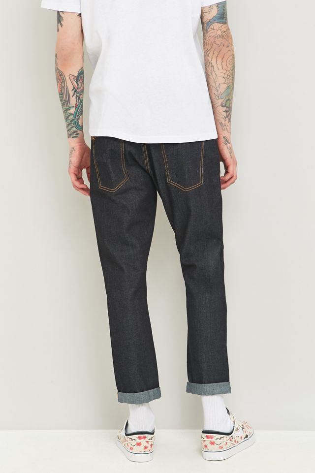 Nudie Jeans Brute Knut Dry Navy Tapered Jeans | Urban Outfitters UK
