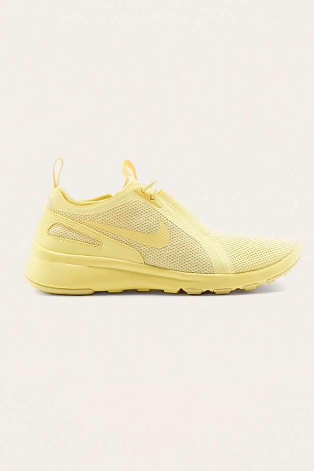Nike Current Yellow Slip-On Trainers | Urban Outfitters UK